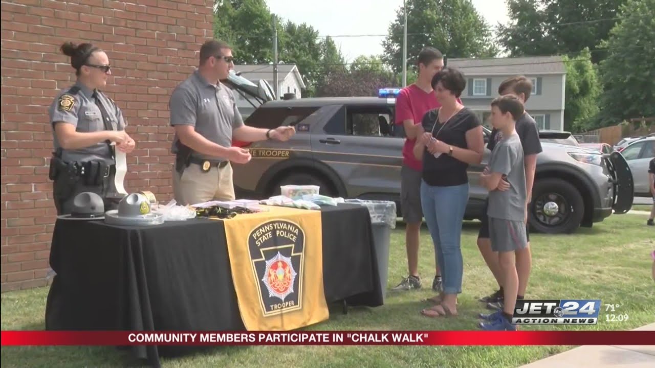 Community comes out for Chalk Our Walk event at Erie PSP barracks - YouTube