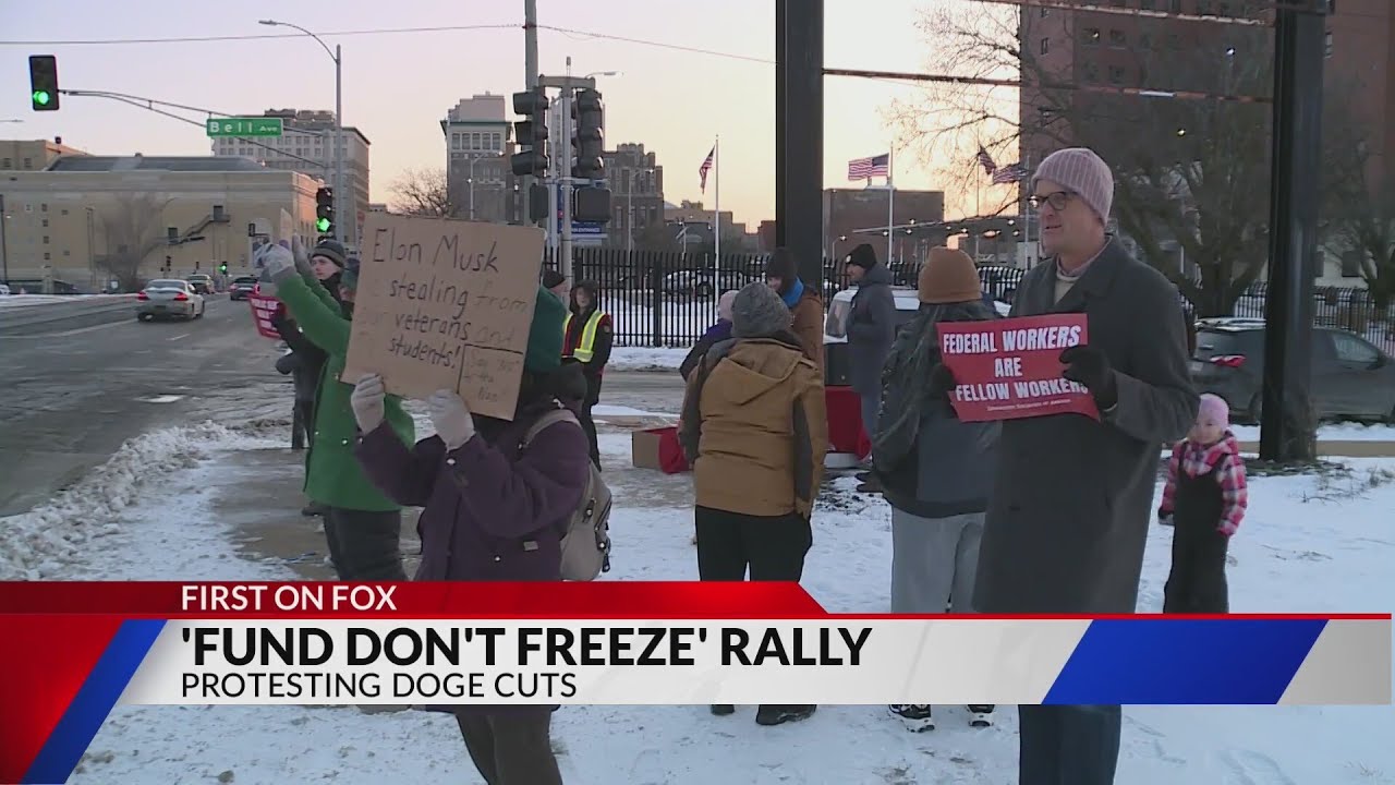 Protesters rally against DOGE funding cuts - YouTube