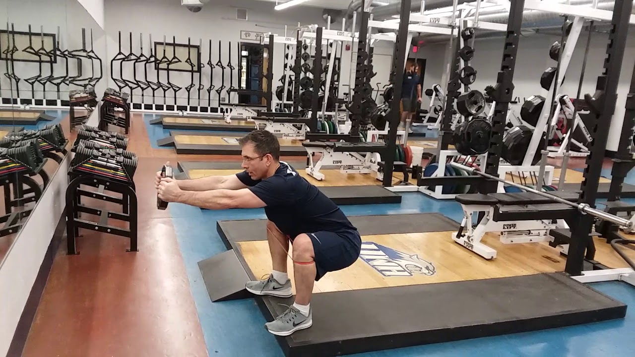 Plate Squat - YouTube