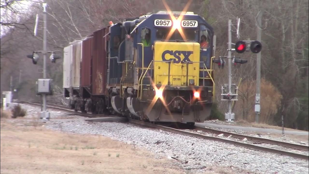 CSX F715-26 with an YN2 GP40-2 leading a GP38-3 seen in Three Towns making its way to the yard ...