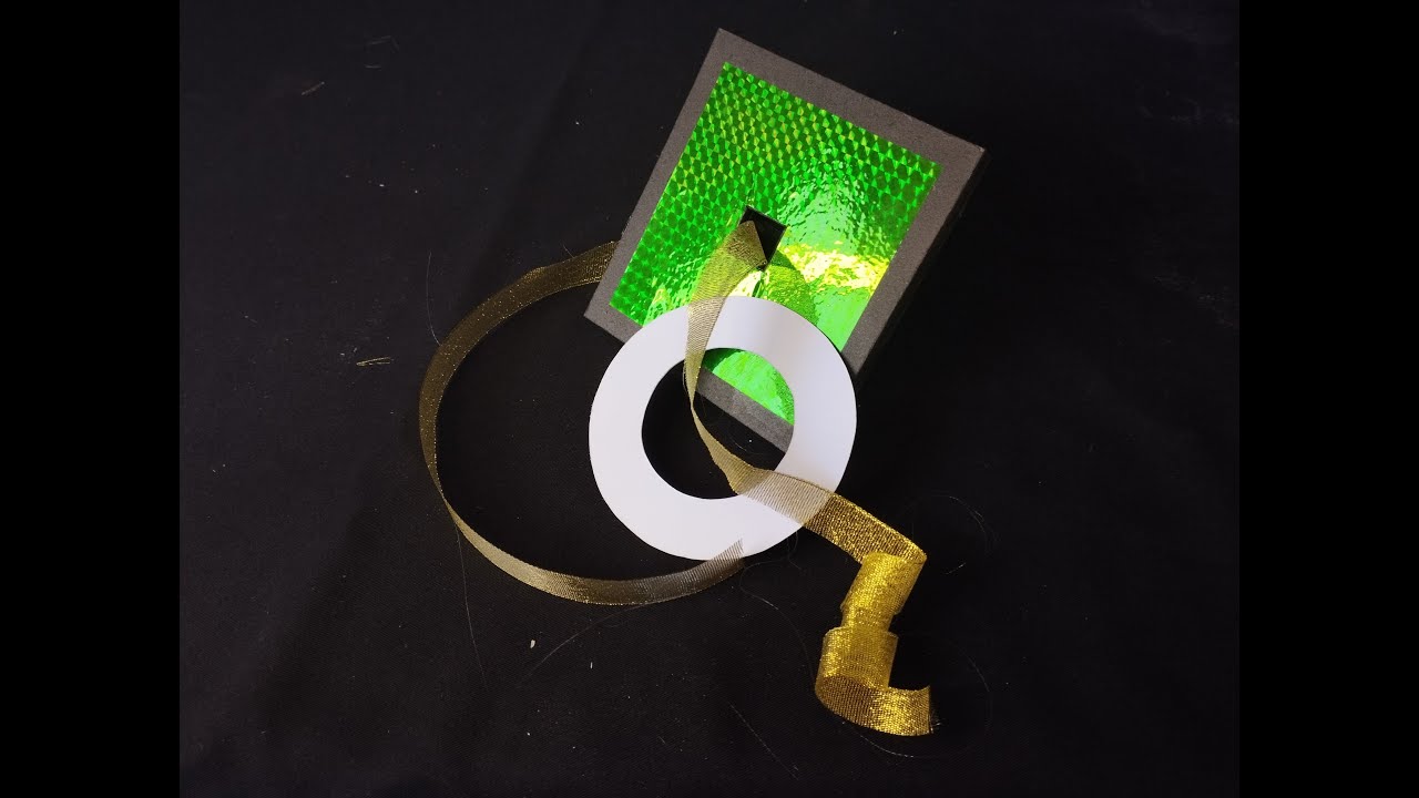 Ribbon through hoop magic trick revealed & how to make. - YouTube