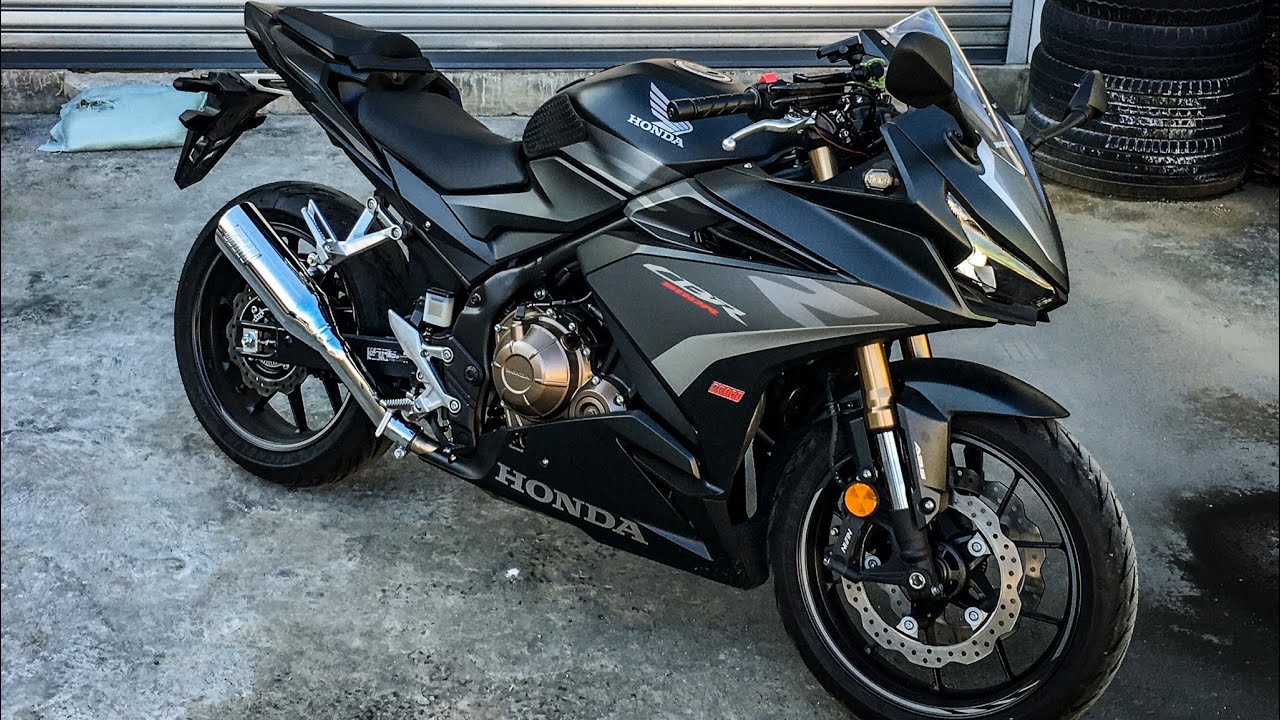 Slip-on exhaust system on a 2022 Honda CBR 500R - YouTube