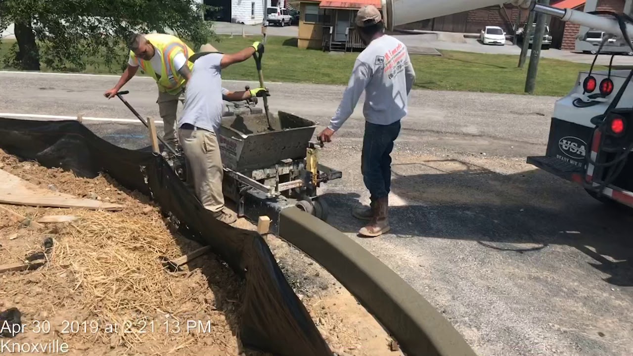 How to Pour concrete to the 8 in of concrete curb for the road - YouTube
