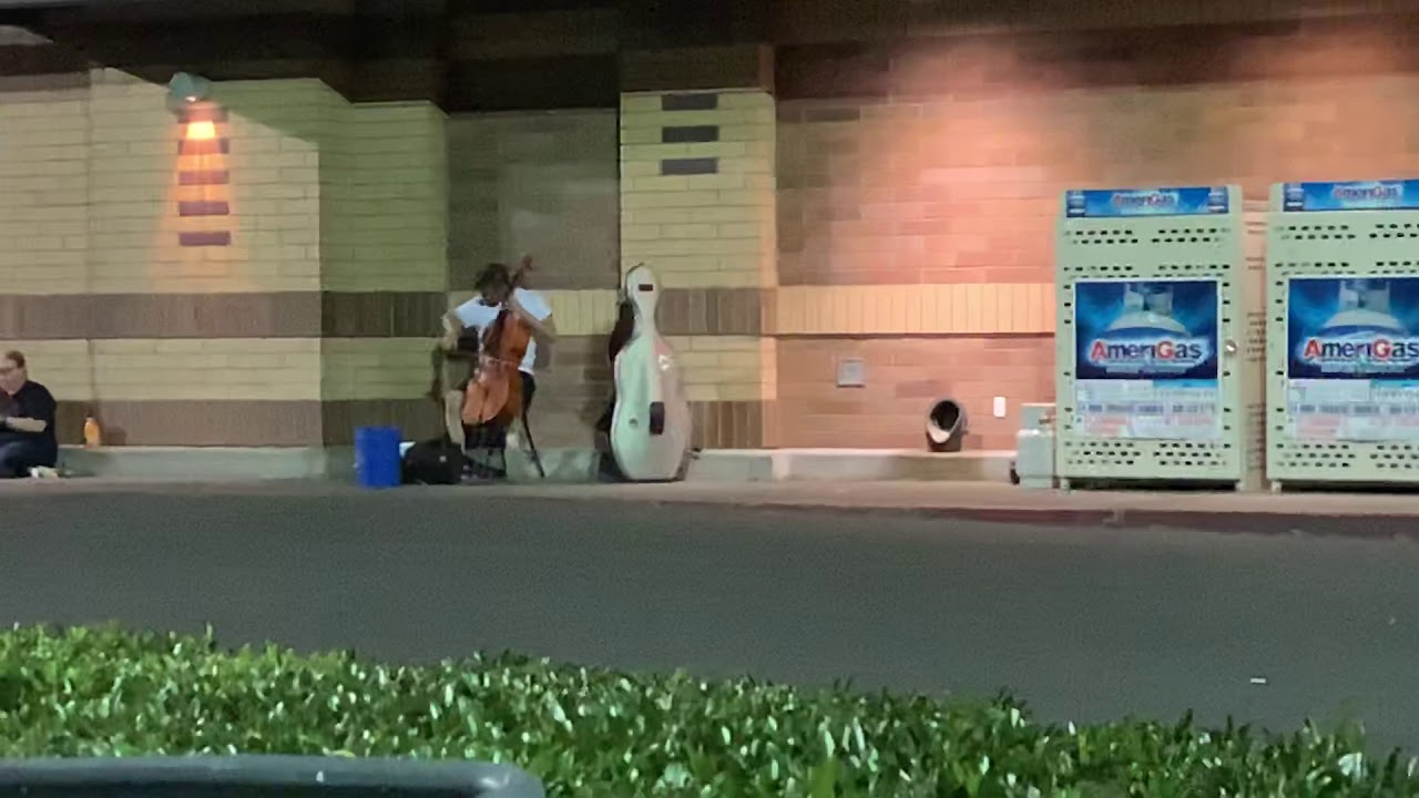 Amazing cellist outside Safeway in St. John’s - YouTube