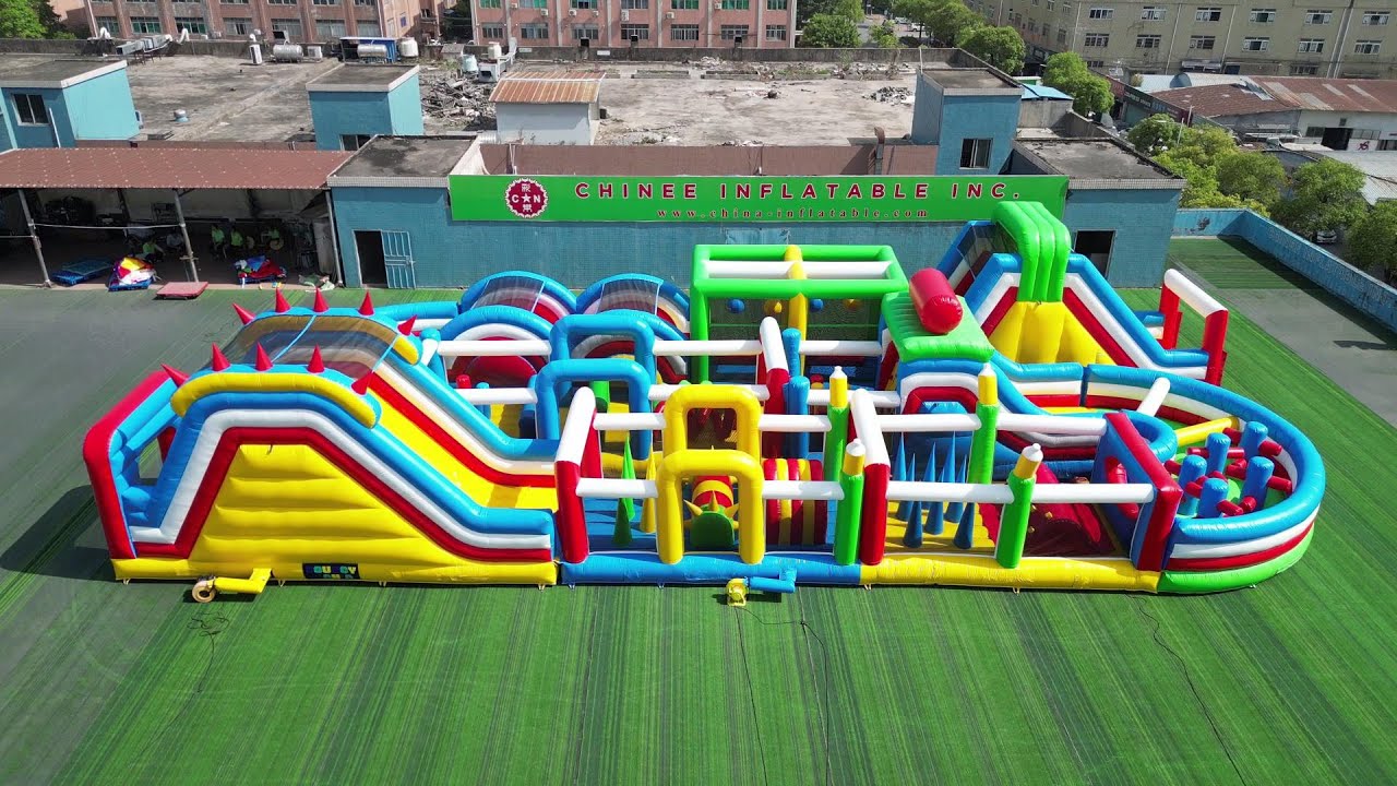 Rainbow Obstacle Course: Slide and Navigate This Inflatable Challenge ...