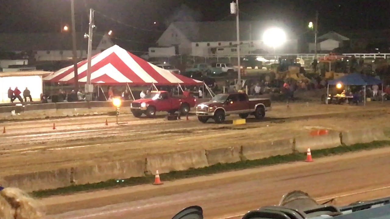 Ford 6.0 Powerstroke VS Ford 6.4 Powerstroke Dirt Drag - YouTube