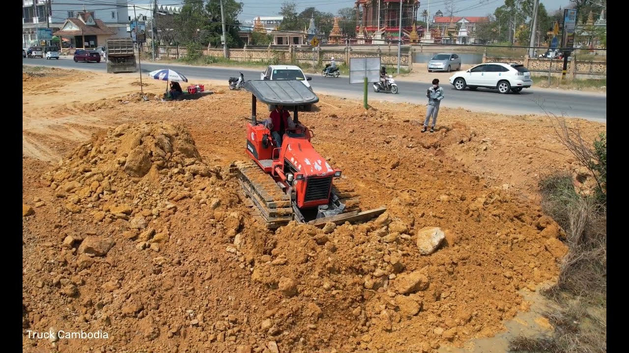 incerdible!! massive swamp landfill by mini bullozer pushing clearing ...