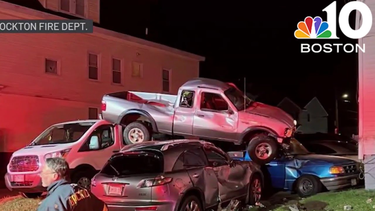 Pick-up truck crashes, lands on cars in Brockton - YouTube