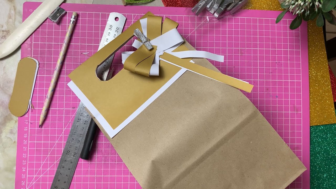 How to fold a gift, in a brown paper bag - The folding gift wrapper ...