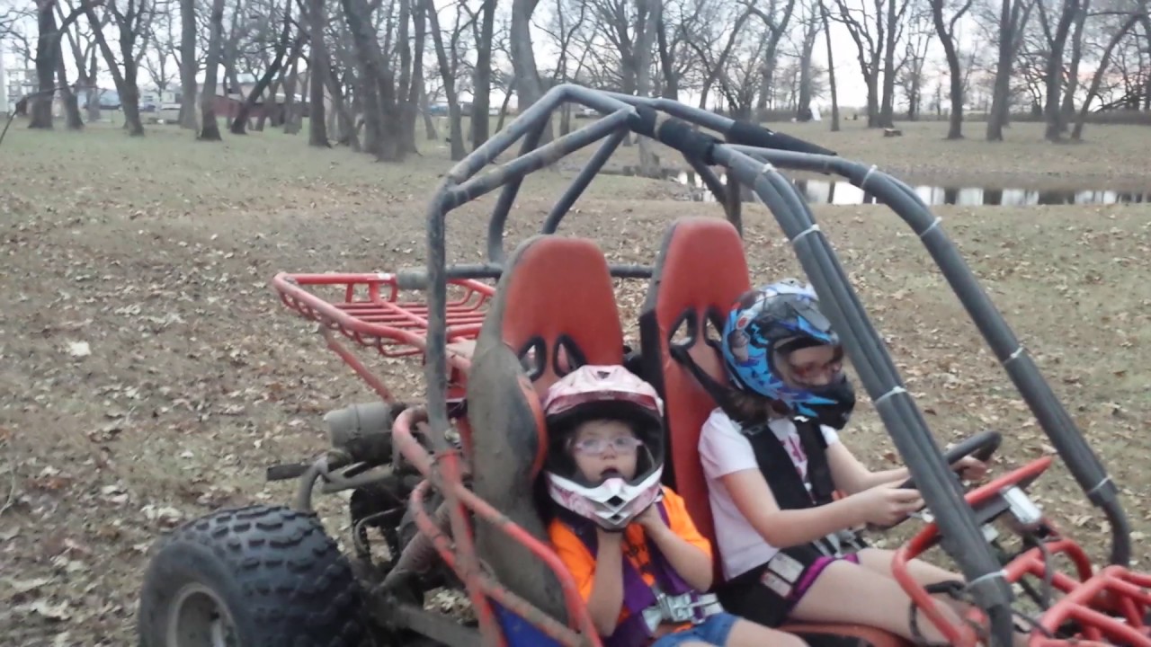 Elise and Emmy on the vision razor jumping the pond dam. - YouTube
