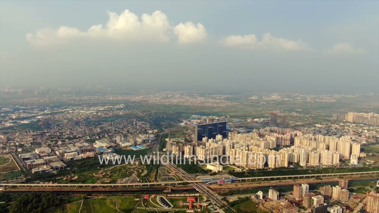 Greater Noida Aerial View of monsoon clouds, residential developments ...