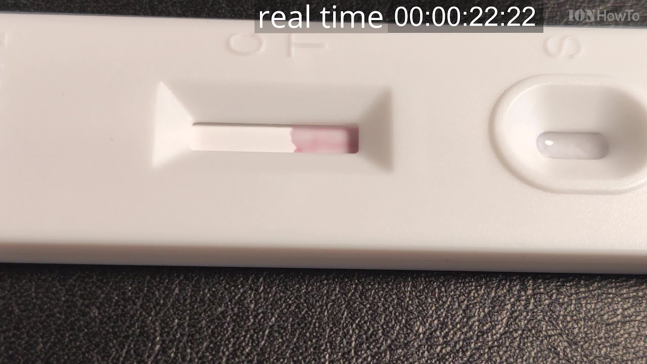 Covid-19 rapid test shows positive result strong thick line - YouTube