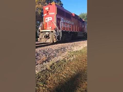 CP 2256 and CP 6236 East at M.P 217 with 2 ballast cars for the merchants track #train # ...