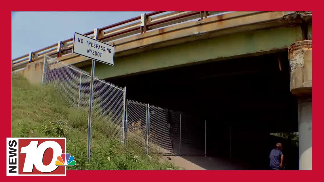 Fences installed under Route 104 bridge in Rochester, pushing out ...