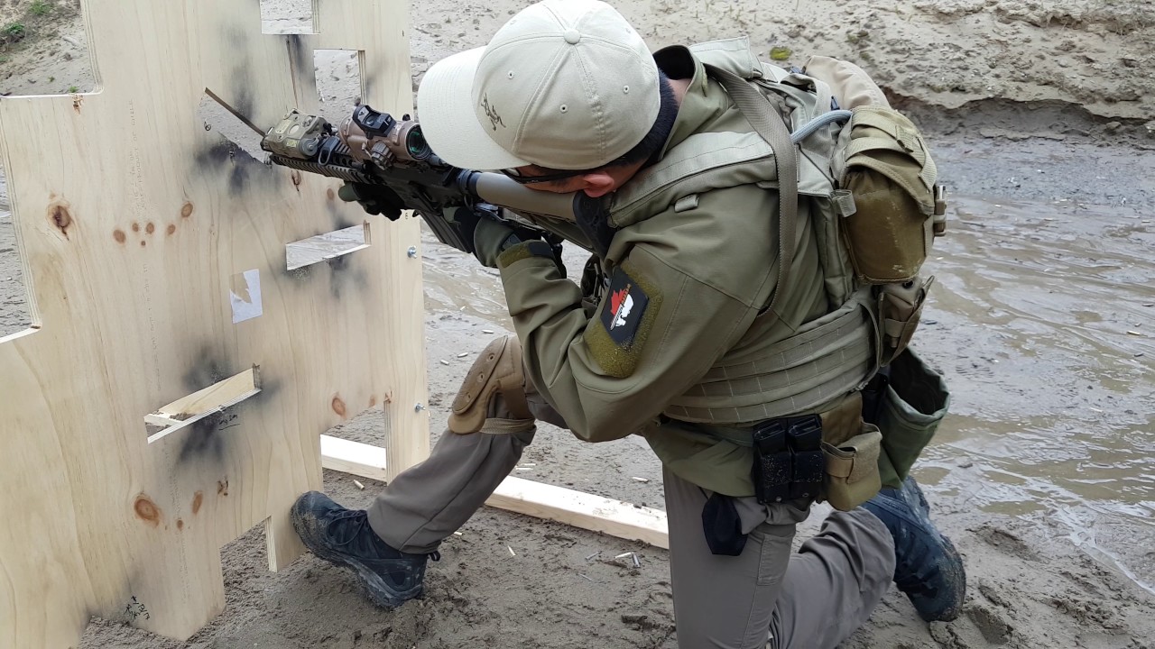 Engaging targets through 9 hole shooting barricade 3/3 - YouTube