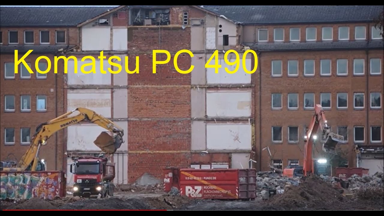 Excavator Komatsu PC 490 load truck - YouTube