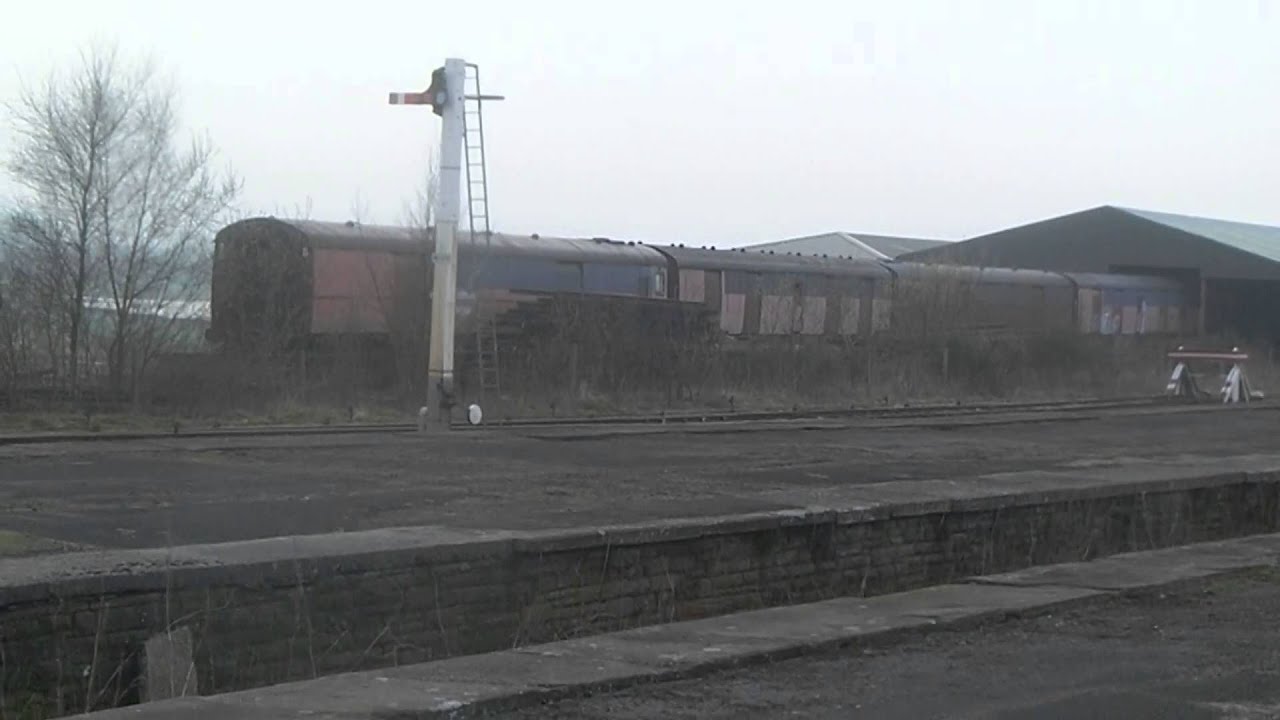 ON THE TRAINS;PASSING STORED TPO,RES WAGONS AT HELLIFIELD STATION SHED ...