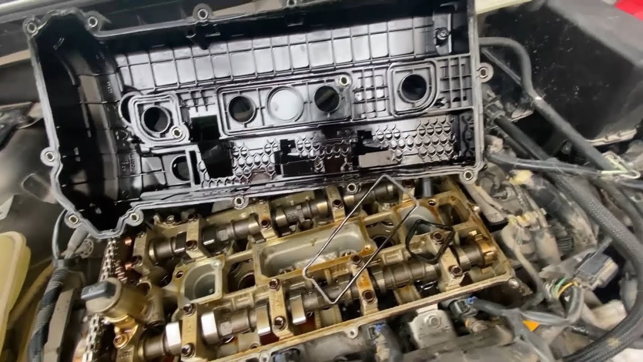 replacement of valve cover gasket on mazda 3 - YouTube