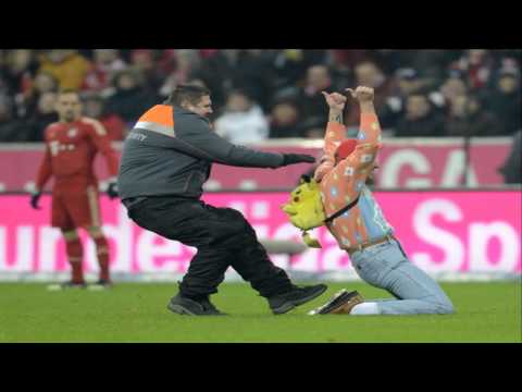 The spectator intrude football-game with Pokemon Pikachu (Bayern Munich vs Borussia Dortmund）
