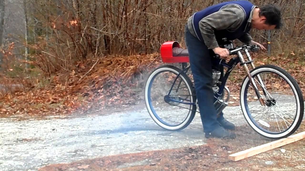 Fred does a smoke show on his motorized bicycle - YouTube