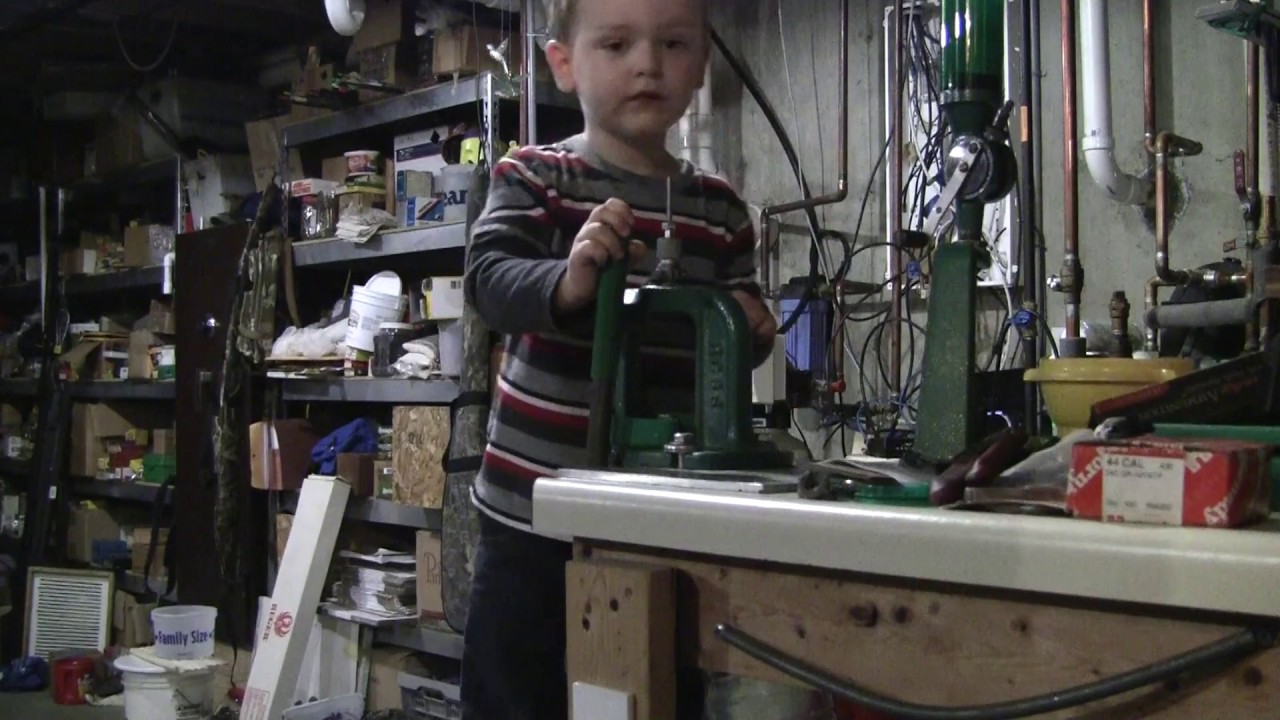 Reloading the 450 Bushmaster, so easy a three year old can do it. - YouTube