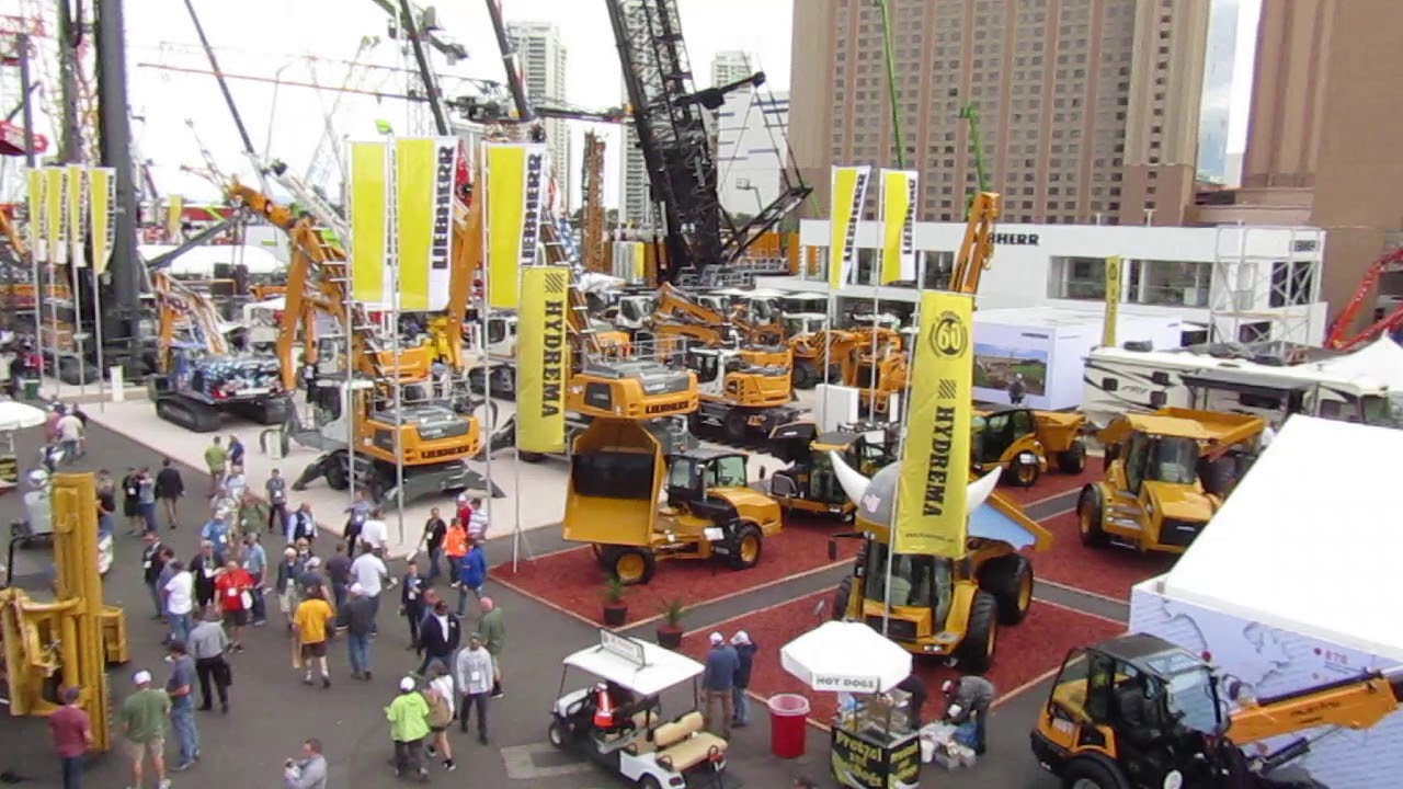Attendees view exhibits and demonstrations in the Festival Lot, CONEXPO ...