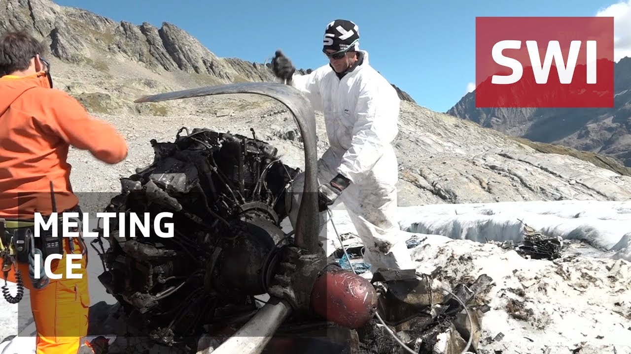 Parts of US plane wreck pulled from glacier 70 years on - YouTube
