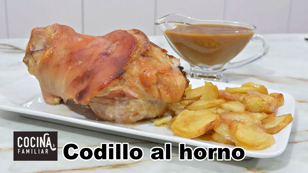 Codillo de cerdo al horno con patatas y salsa española ideal para los ...