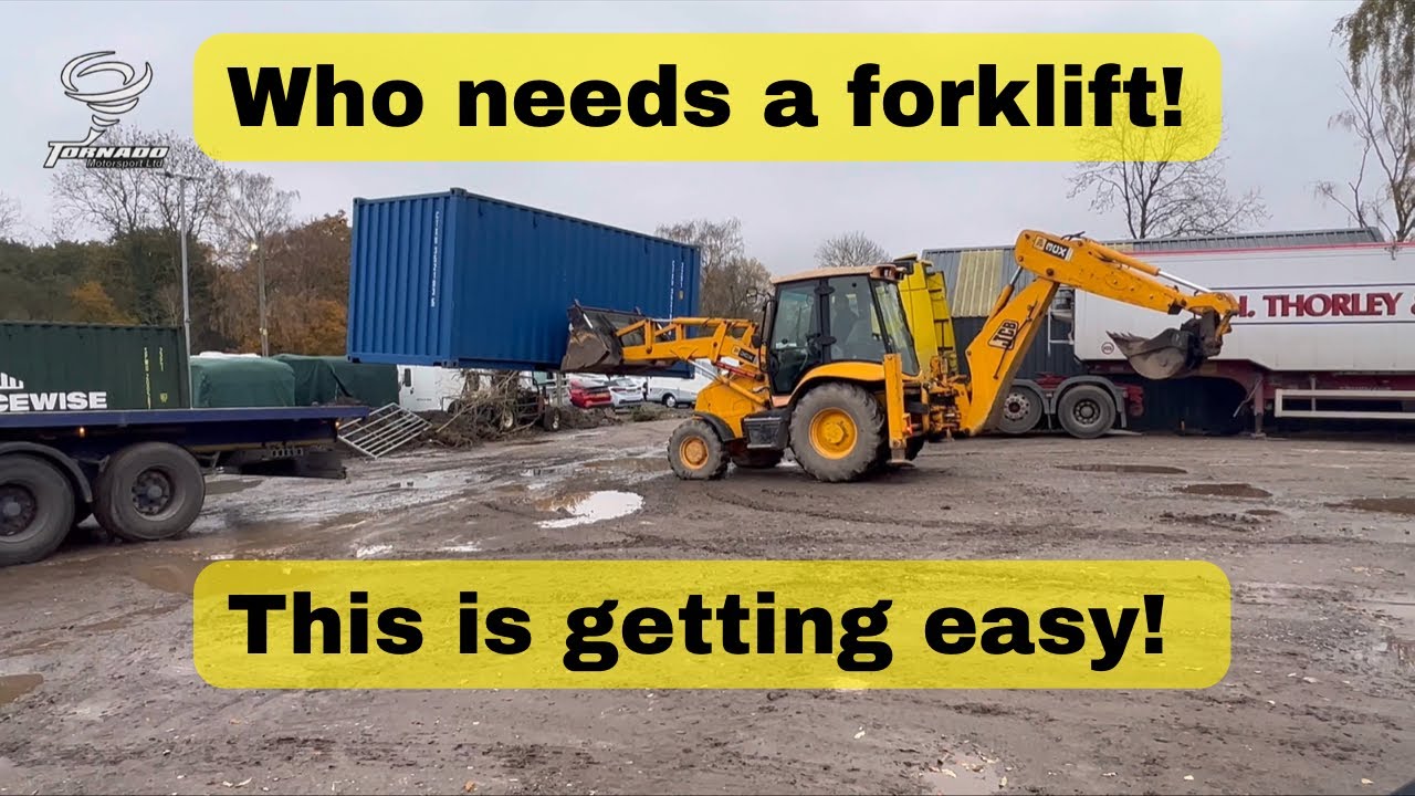 JCB 3cx unloading a 20ft shipping container with ease - YouTube