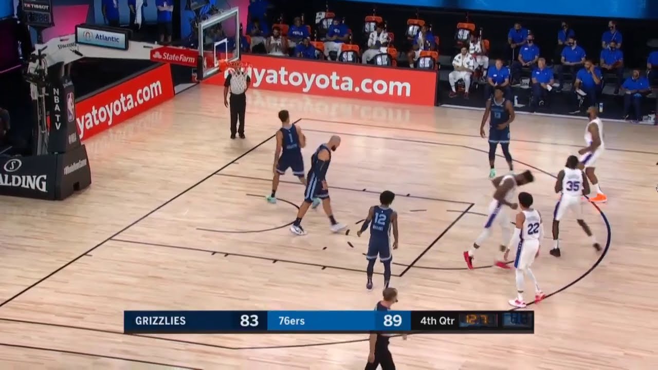 the entire 76ers bench stands up in sync with the 76ers liberty bell ...