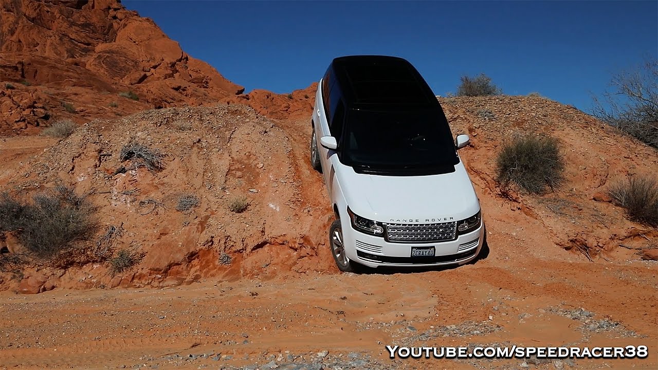 Range Rover playing in sand dunes - YouTube