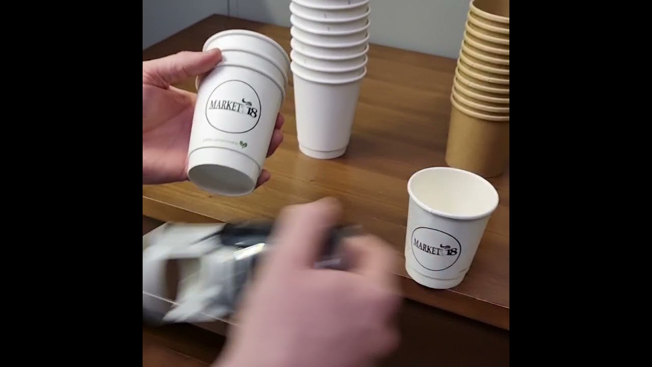 Printing coffee cups with a rubber stamp. - YouTube