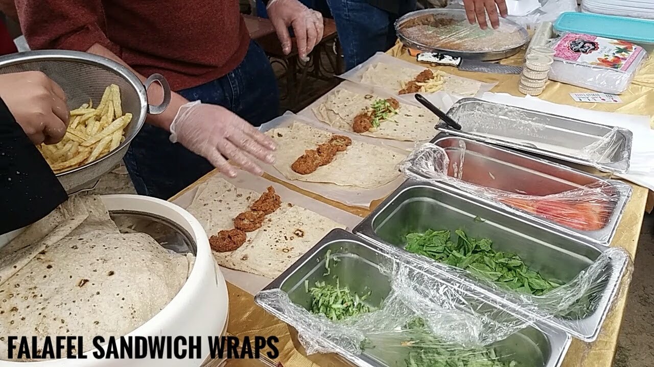 Falafel sandwich wrap - street food stall - Falafel sandwich Arabic ...