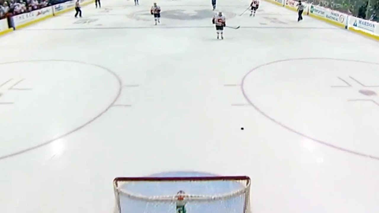 Flames score on own empty net on delayed call - YouTube