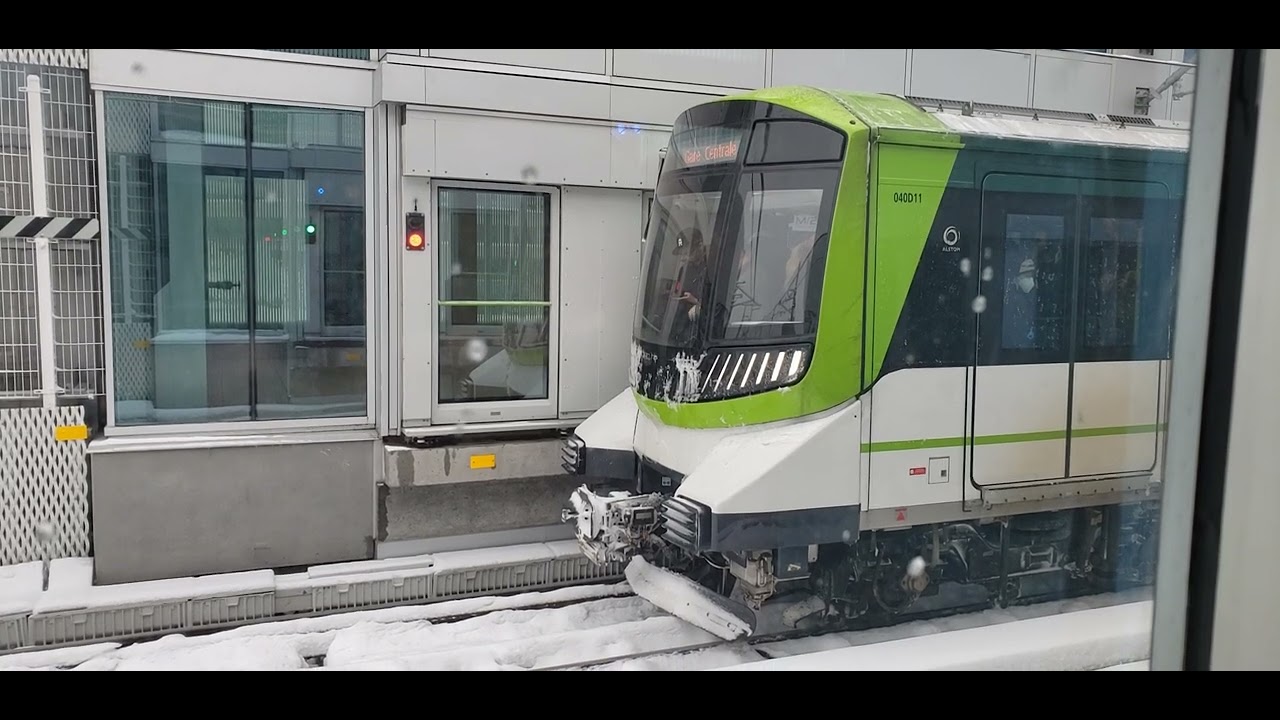MONTREAL REM Snowy Day Station Stop at Ile Des Soeurs - YouTube
