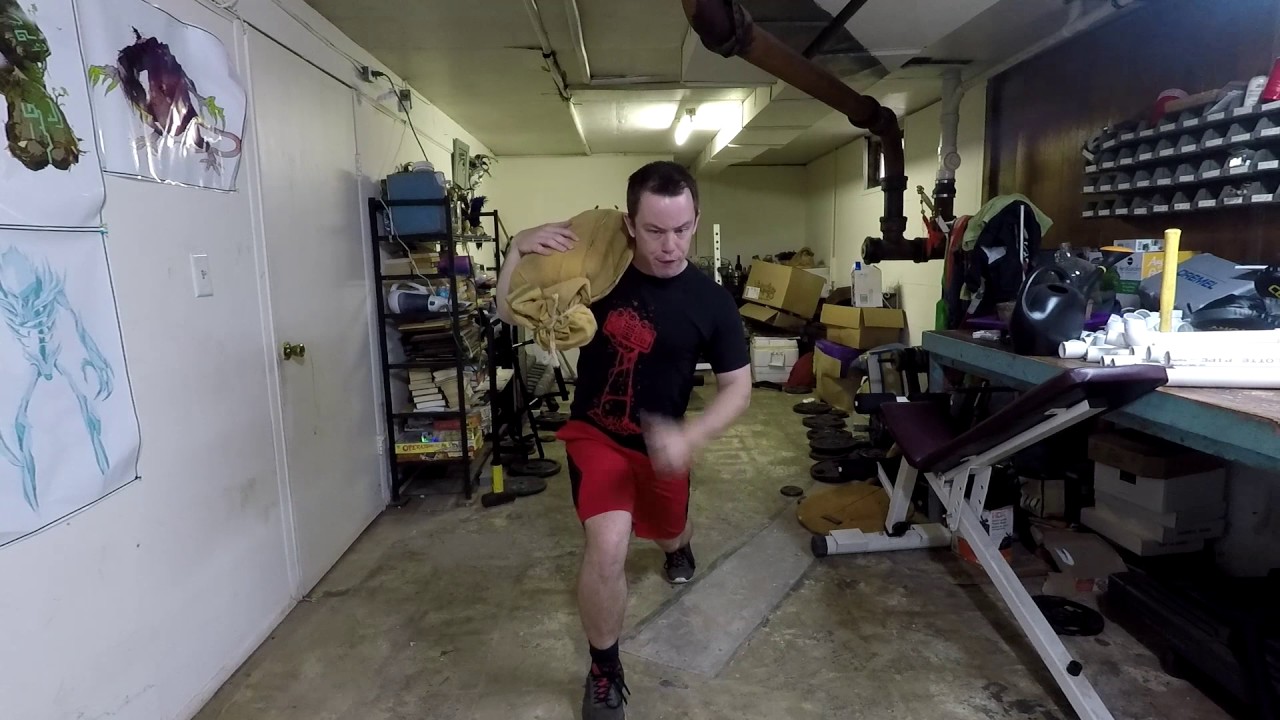 How to Do Sandbag Walking Lunges - Sandbag Exercise Tutorial - YouTube
