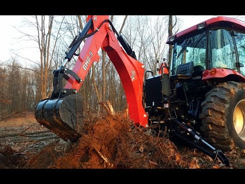 #130 How to Remove Stumps With Backhoe On RK55 - YouTube