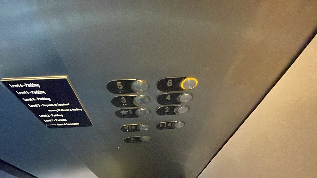 Otis Glass Elevators at Milwaukee Airport Rental Car Garage - YouTube