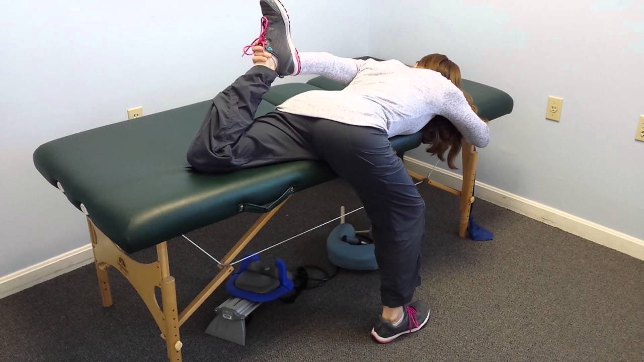 Prone Quad Stretch on Table - YouTube