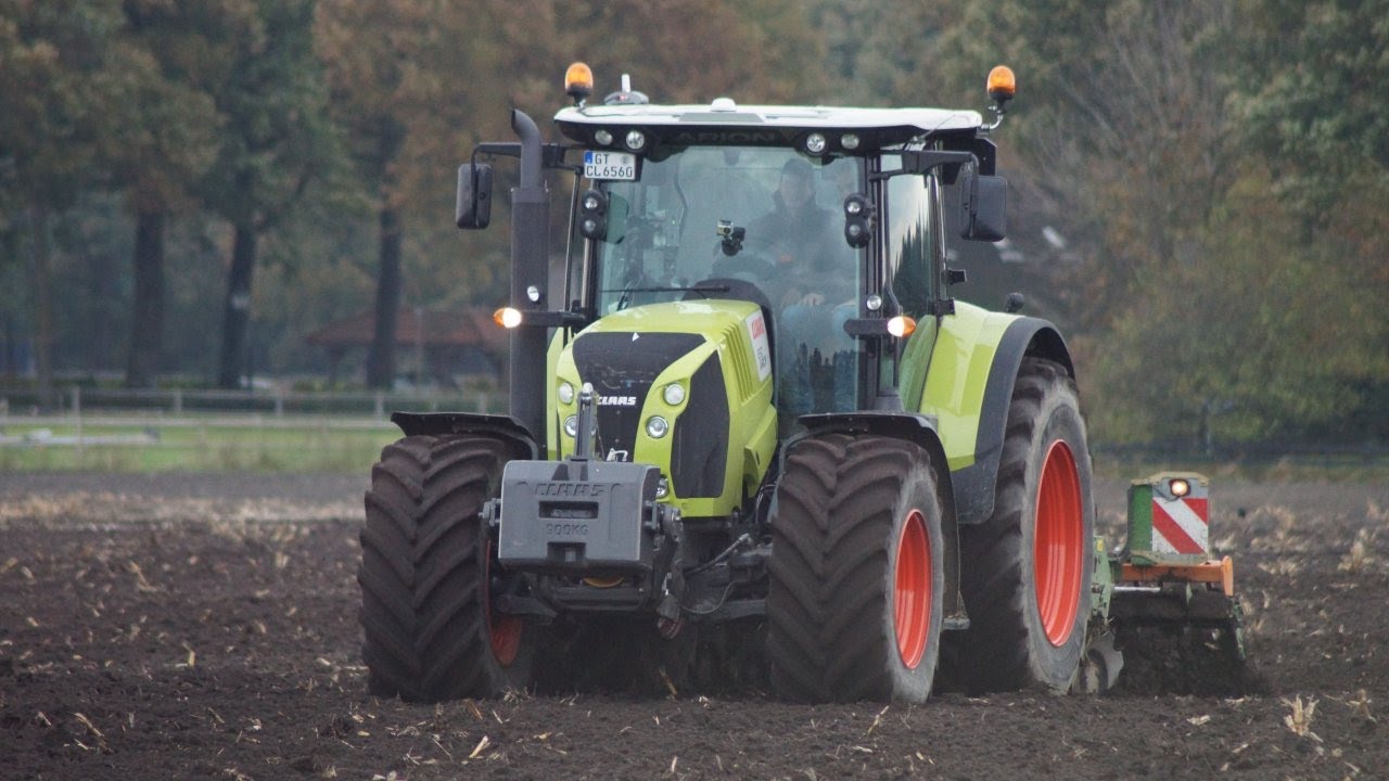 Claas Arion 650 met AmazoneTrekkerweb - YouTube