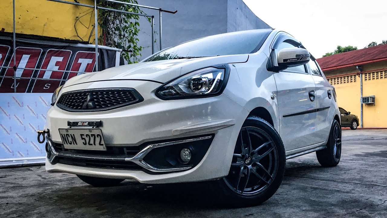 Full exhaust system on a Mitsubishi Mirage HB - YouTube