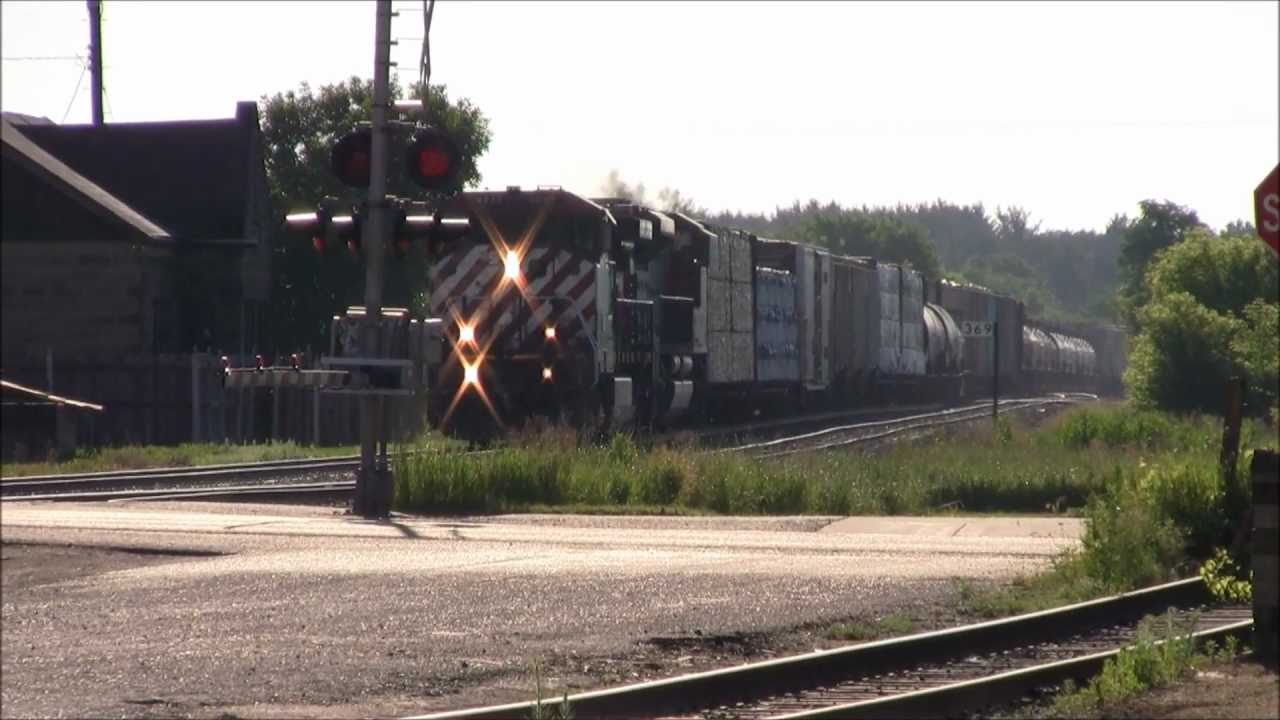 BCOL 4643 Leads a CN Manifest Train west out of Colfax, WI. - YouTube