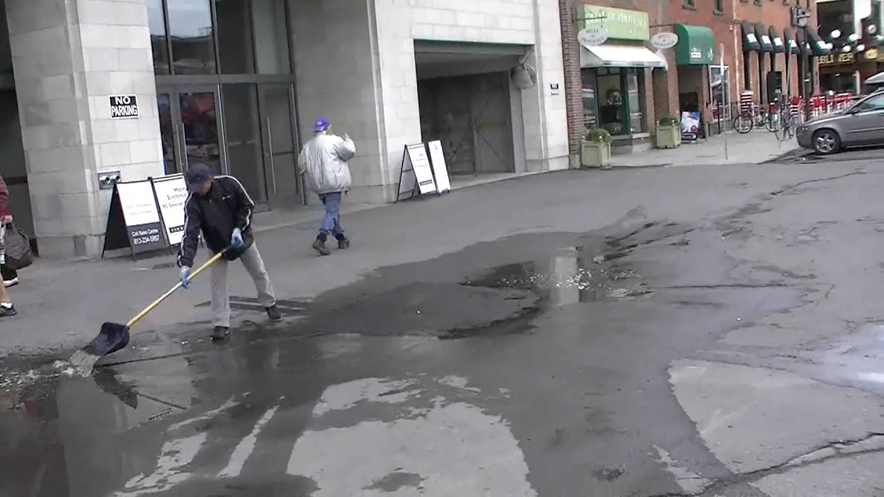 One Minute of a Man Shoveling Water - YouTube