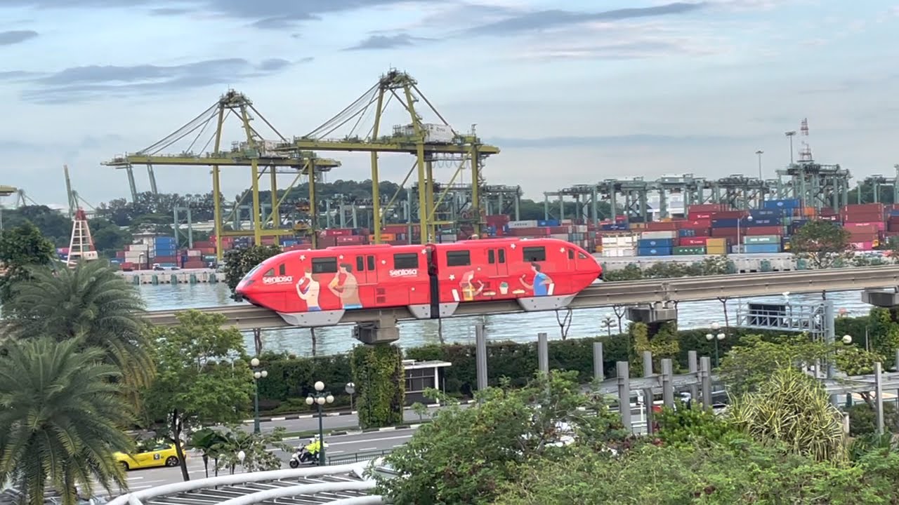 Sentosa Express Hitachi Small-type Monorail [Red Trainset] approaching ...