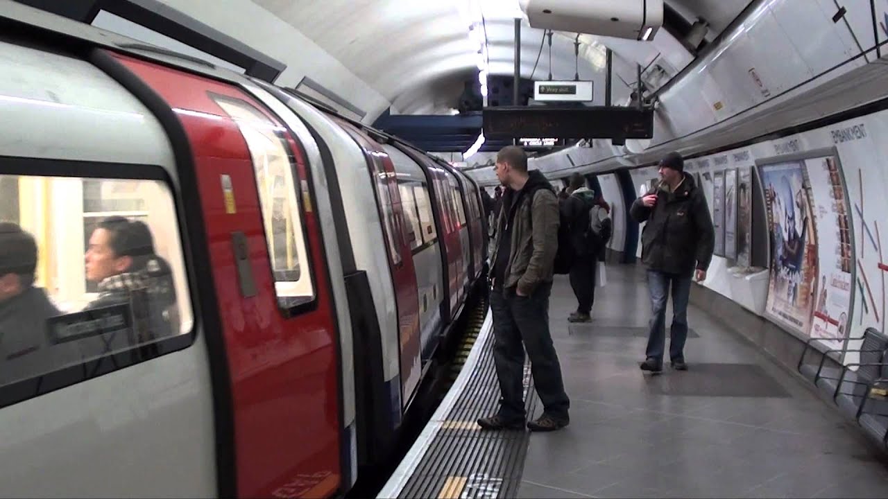 Mind the Gap -- Northern line train arriving at and departing from ...