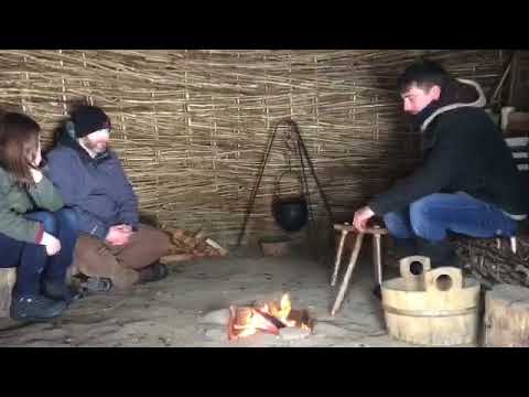 Early medieval roundhouse at UCD in the snow - YouTube