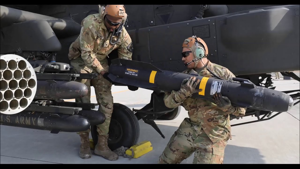 Soldiers Arm Apache Gunships - YouTube