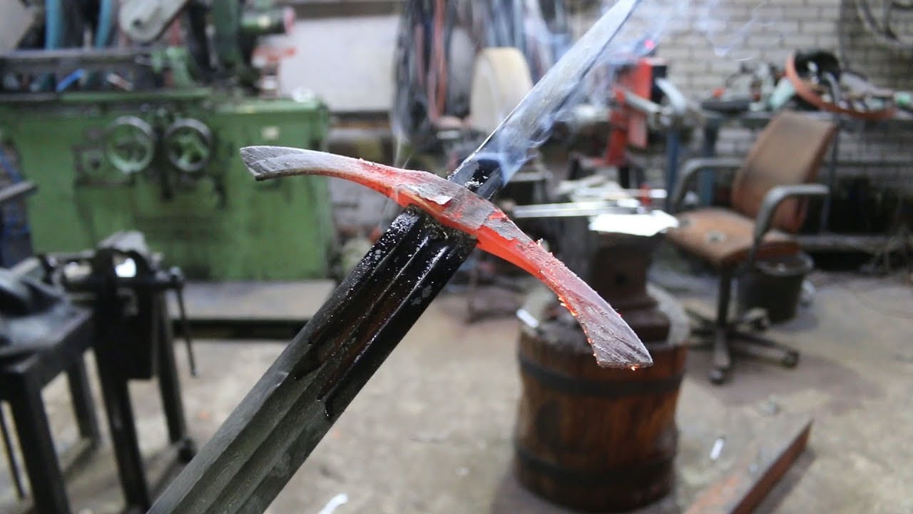 Forging a longsword, part 2, forging the cross guard. - YouTube
