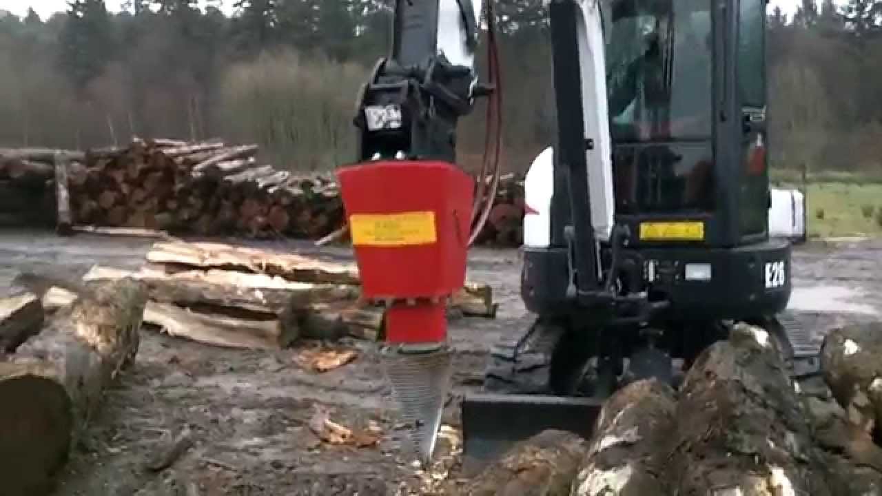 Split timber down using your excavator - The Lasco Roli - YouTube