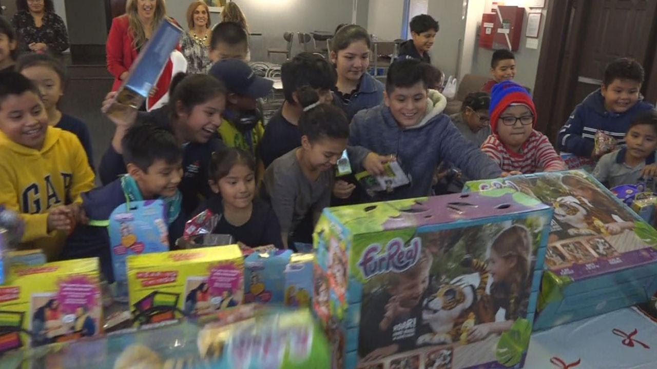 Kids in Need Get Surprised With This Year's Top Toys - YouTube